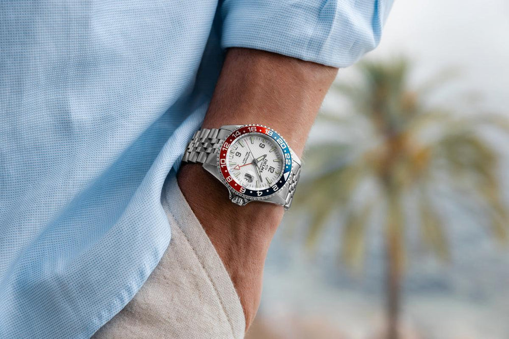 DELMA Santiago GMT Meridian Automatic Blue Red Bezel White Dial